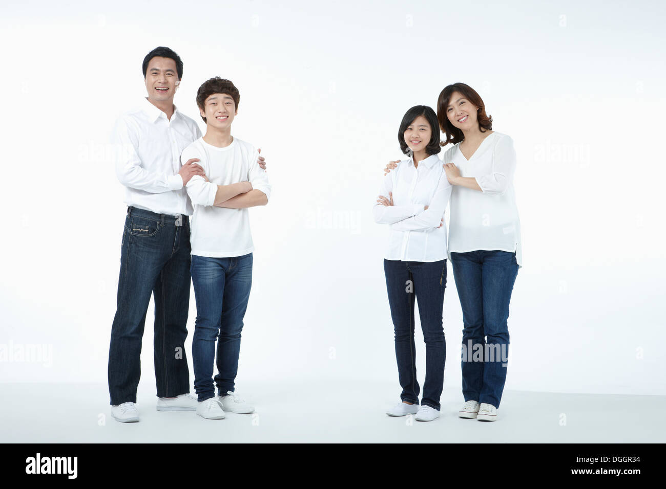 a family standing together Stock Photo - Alamy