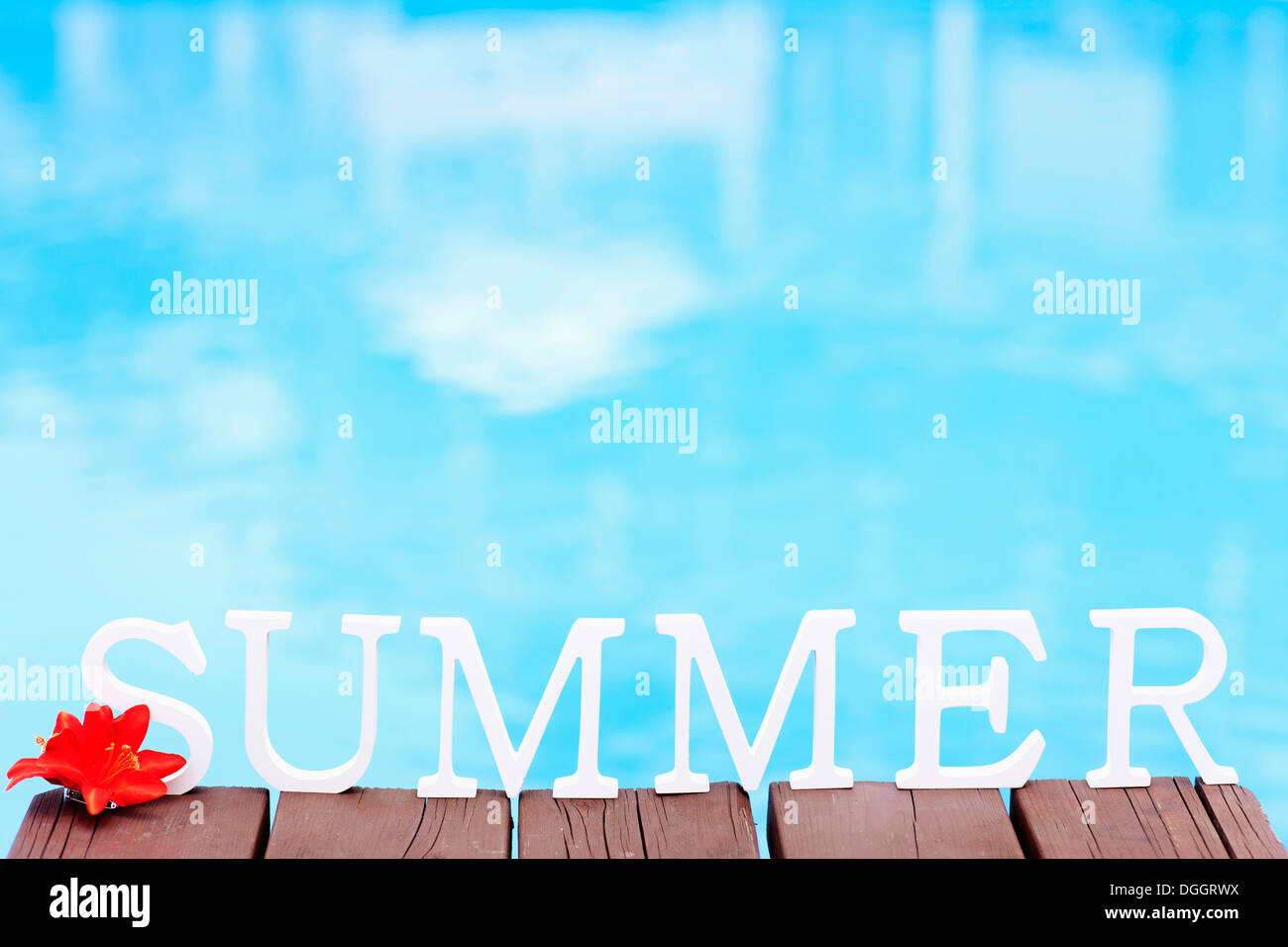 the word summer next to a pool Stock Photo - Alamy