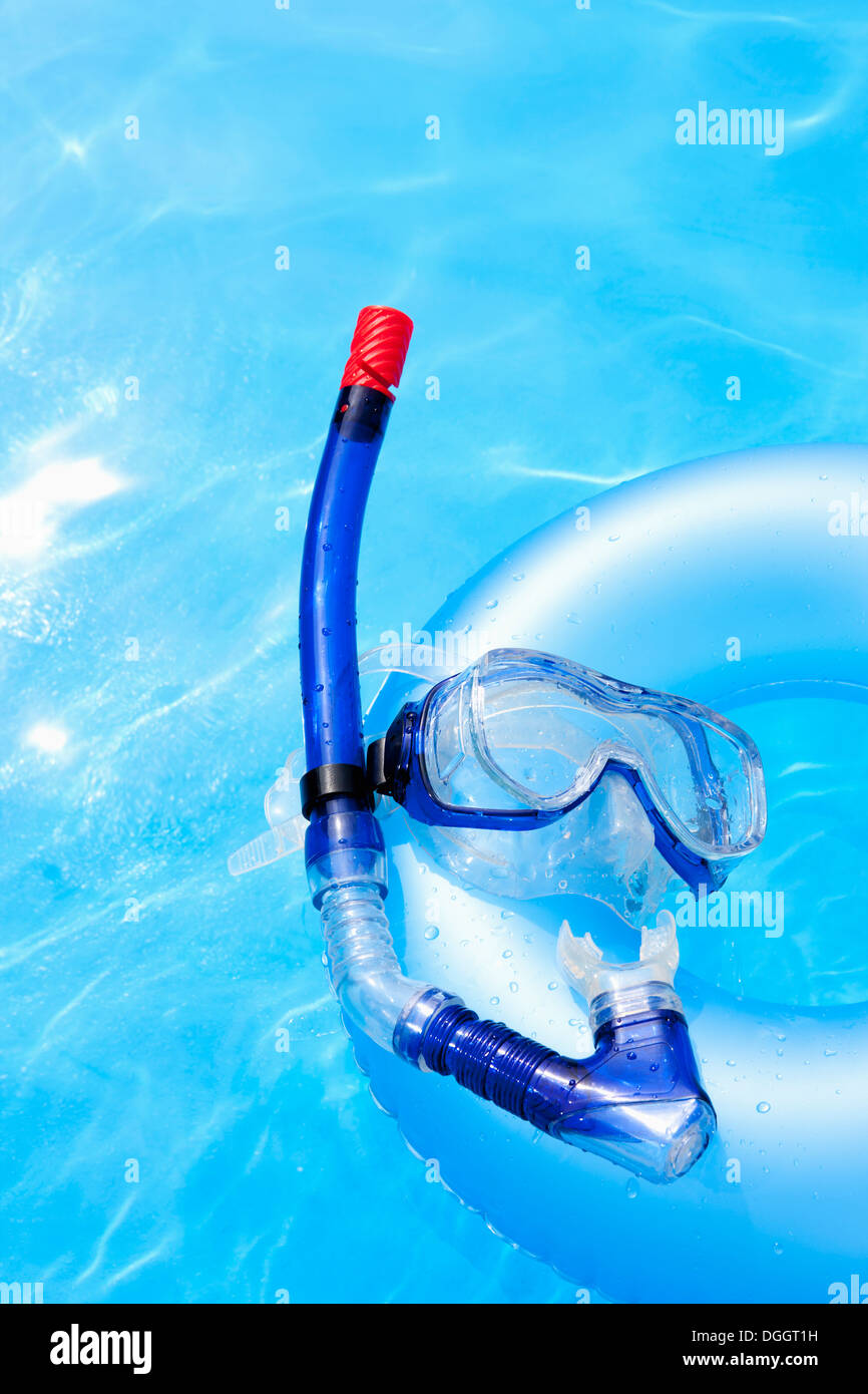 a diving mask and a swimming tube in a pool Stock Photo - Alamy