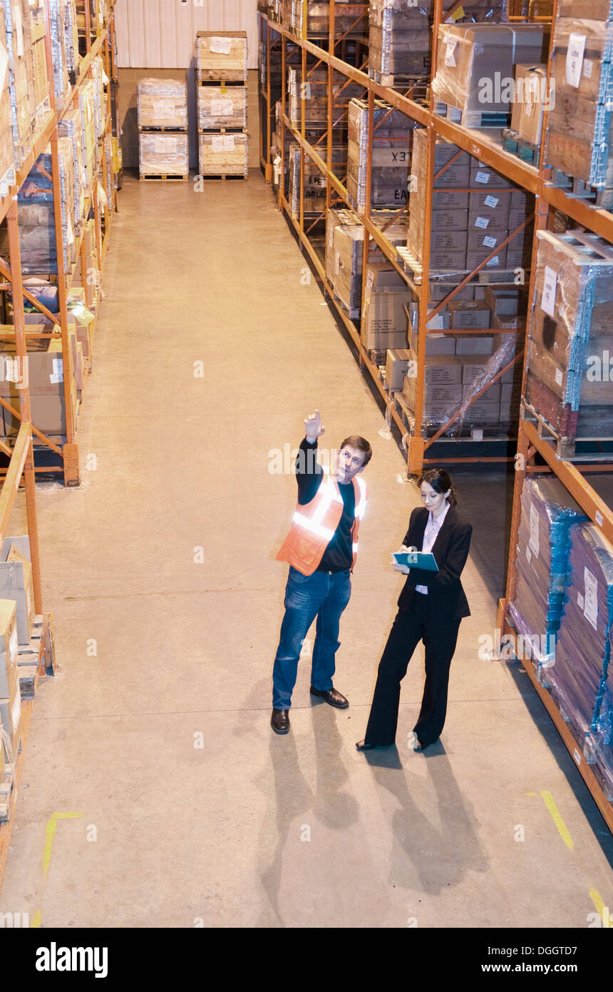 Manager supervising warehouse hi-res stock photography and images - Alamy