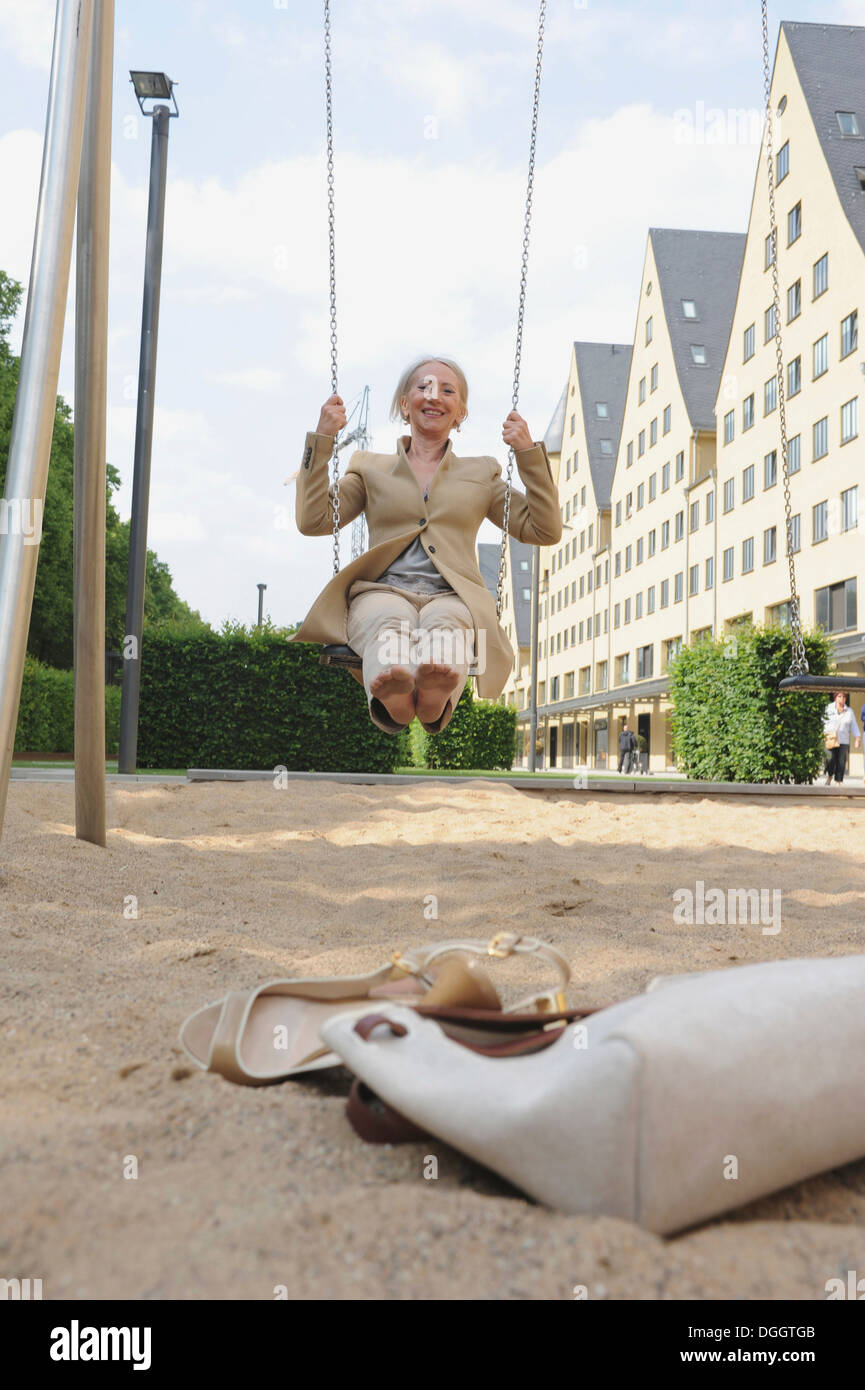 Woman swing fashion hi-res stock photography and images - Alamy