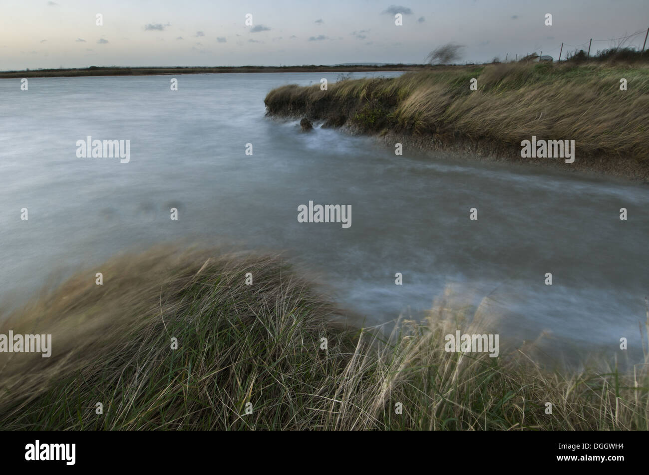 Estuary habitat in stormy weather at sunset Cliffe Pools RSPB Reserve ...