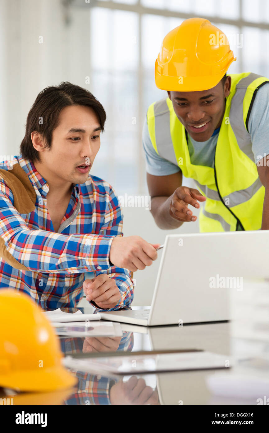 Male engineers using laptop hi-res stock photography and images - Alamy