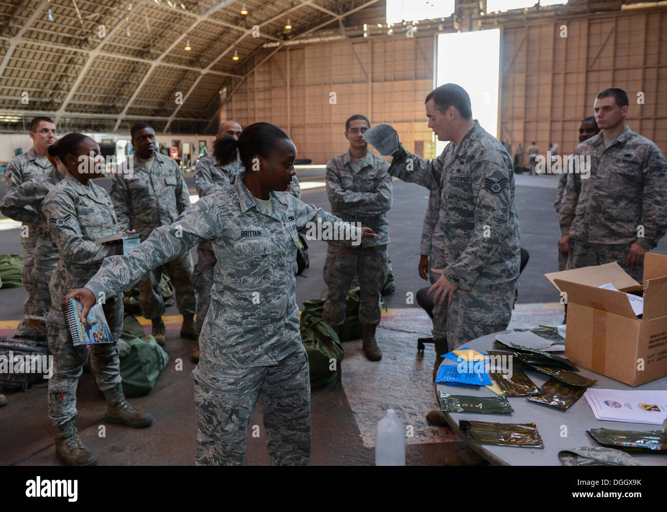 Staff Sgt. Timothy Lyons, 374th Civil Engineer Squadron, simulates ...