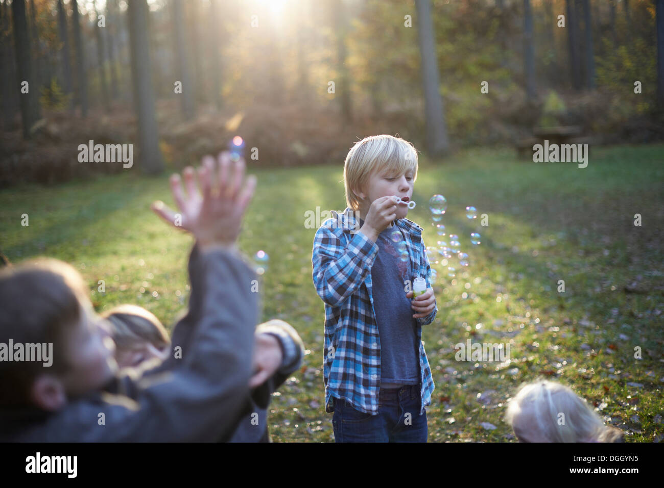 Child popping bubbles hi-res stock photography and images - Alamy