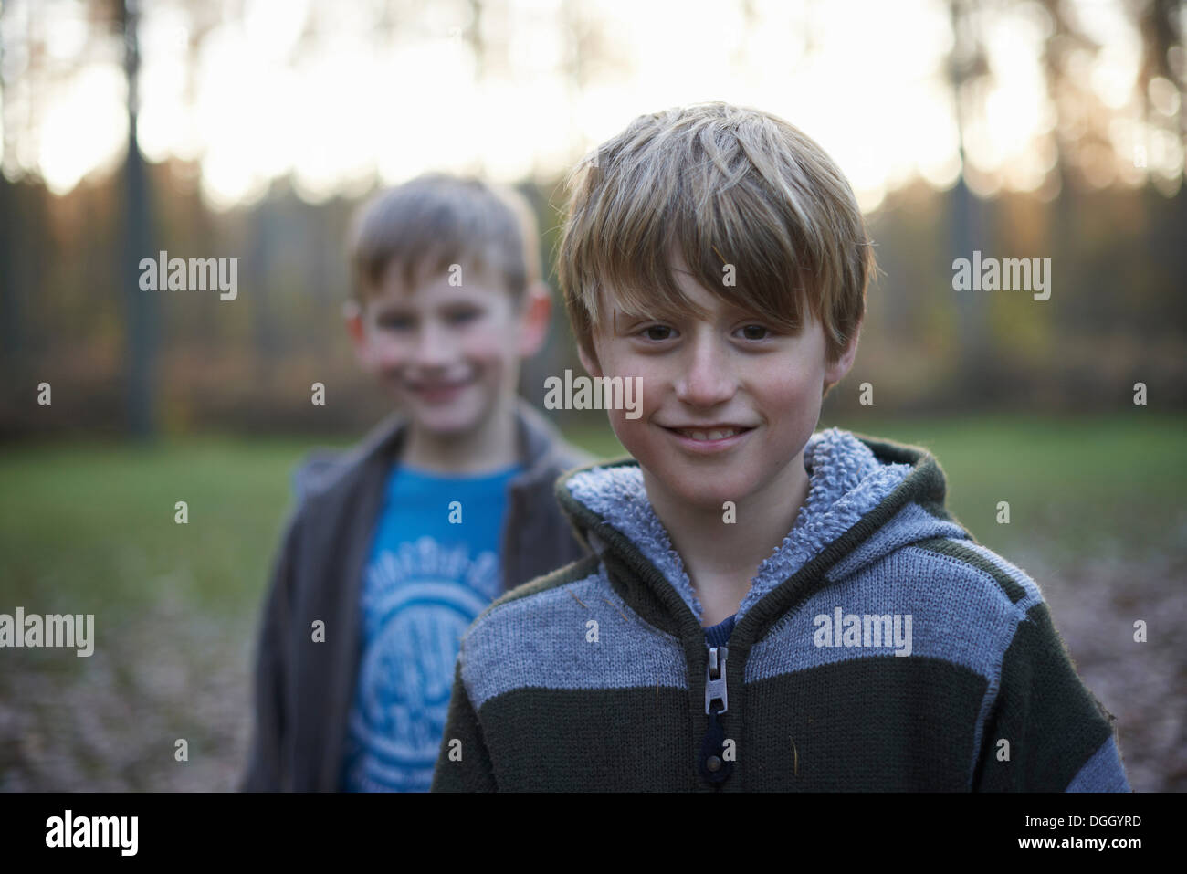 Portrait of boys in forest Stock Photo - Alamy