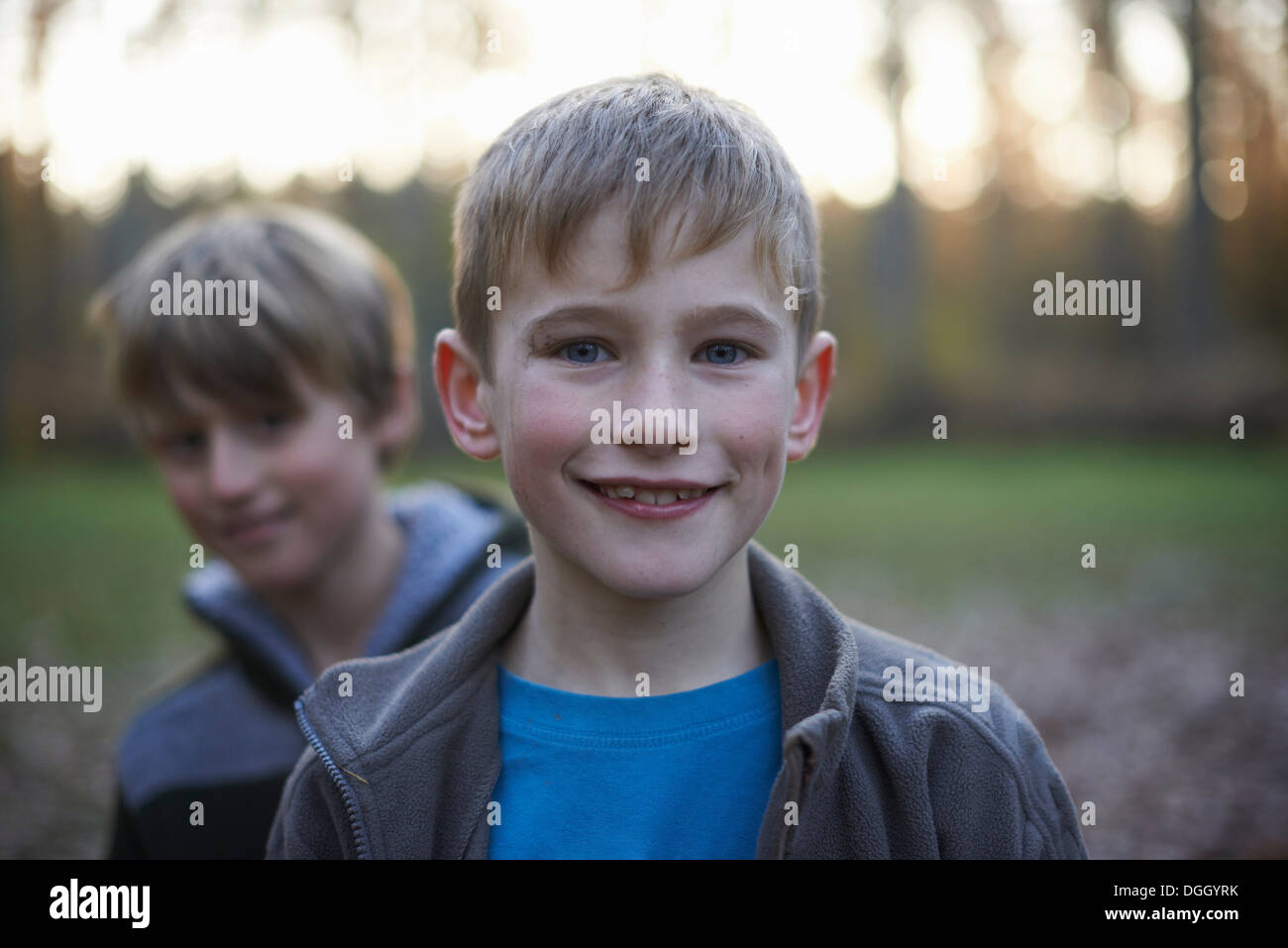 Portrait of boys in forest Stock Photo - Alamy