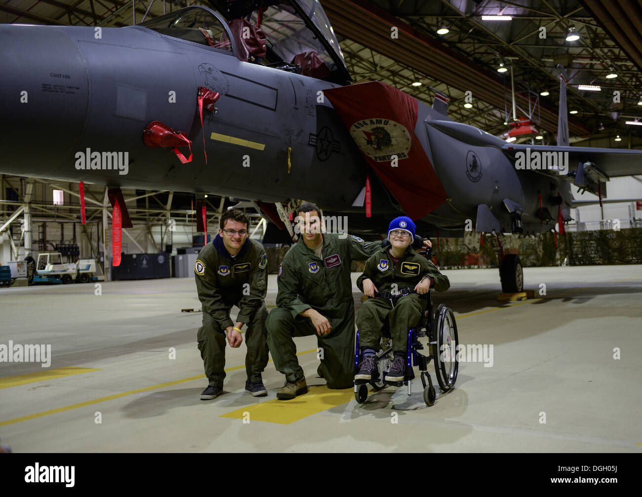 Maj. Jason Bianchi, 48th Operations Support Squadron chief of current operations (center), poses ...