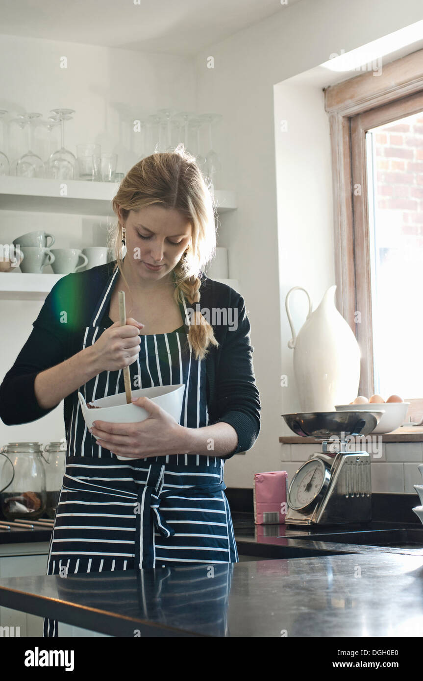 Woman stirring bowl black and white hi-res stock photography and images ...