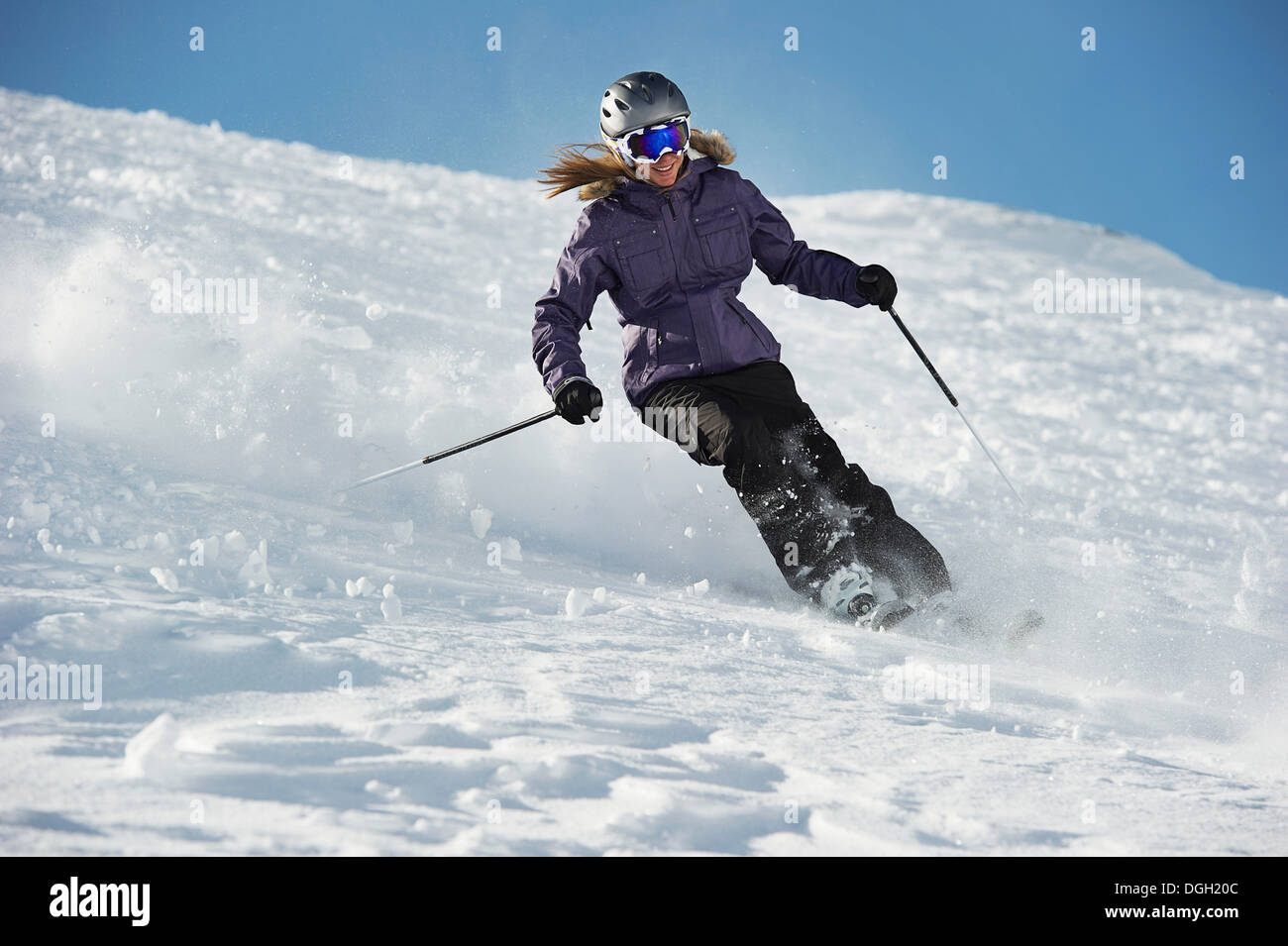 Woman powder skiing hi-res stock photography and images - Alamy