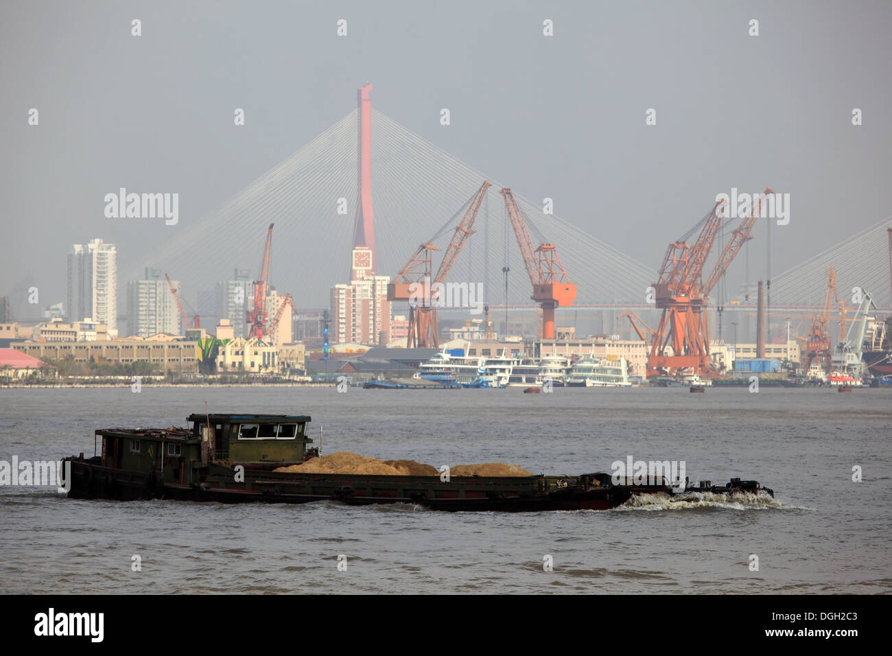 Barge on the Huangpu river in Shanghai, China Stock Photo - Alamy