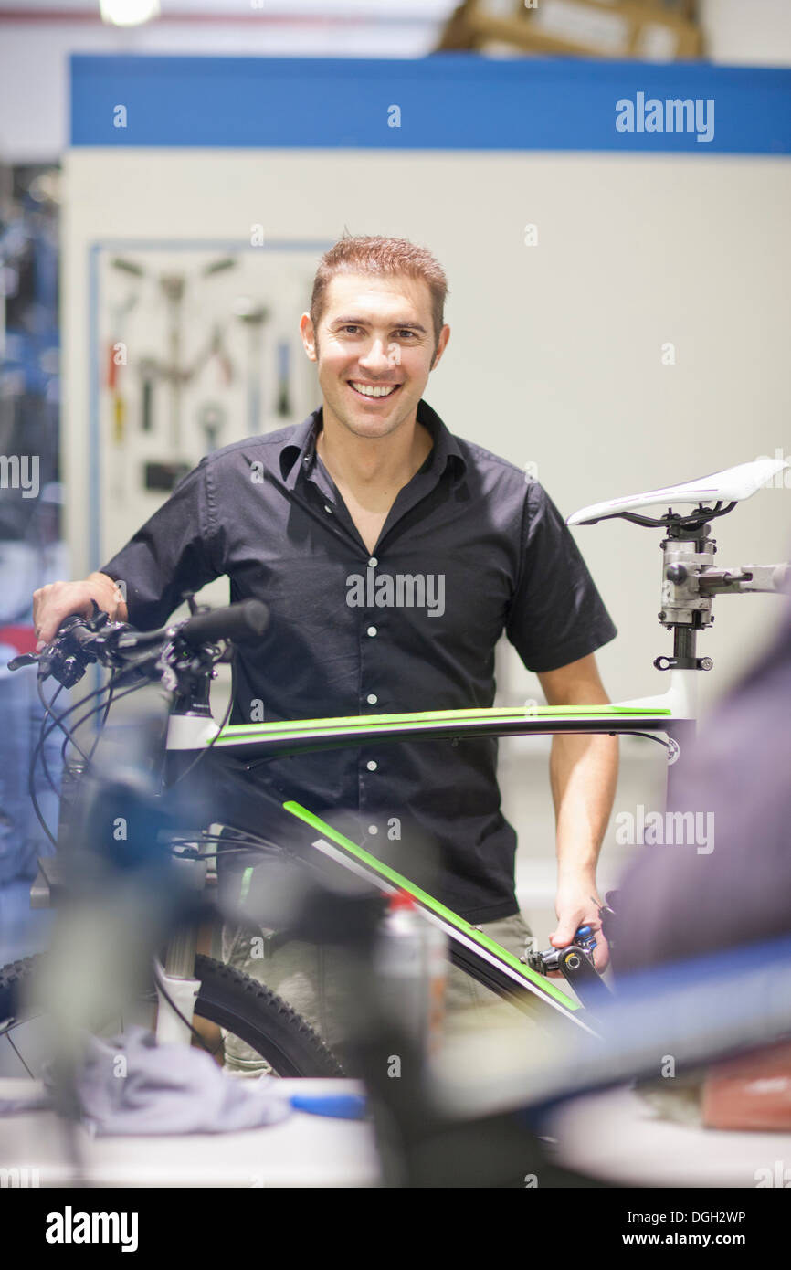 Black man repair shop worker hi-res stock photography and images - Alamy
