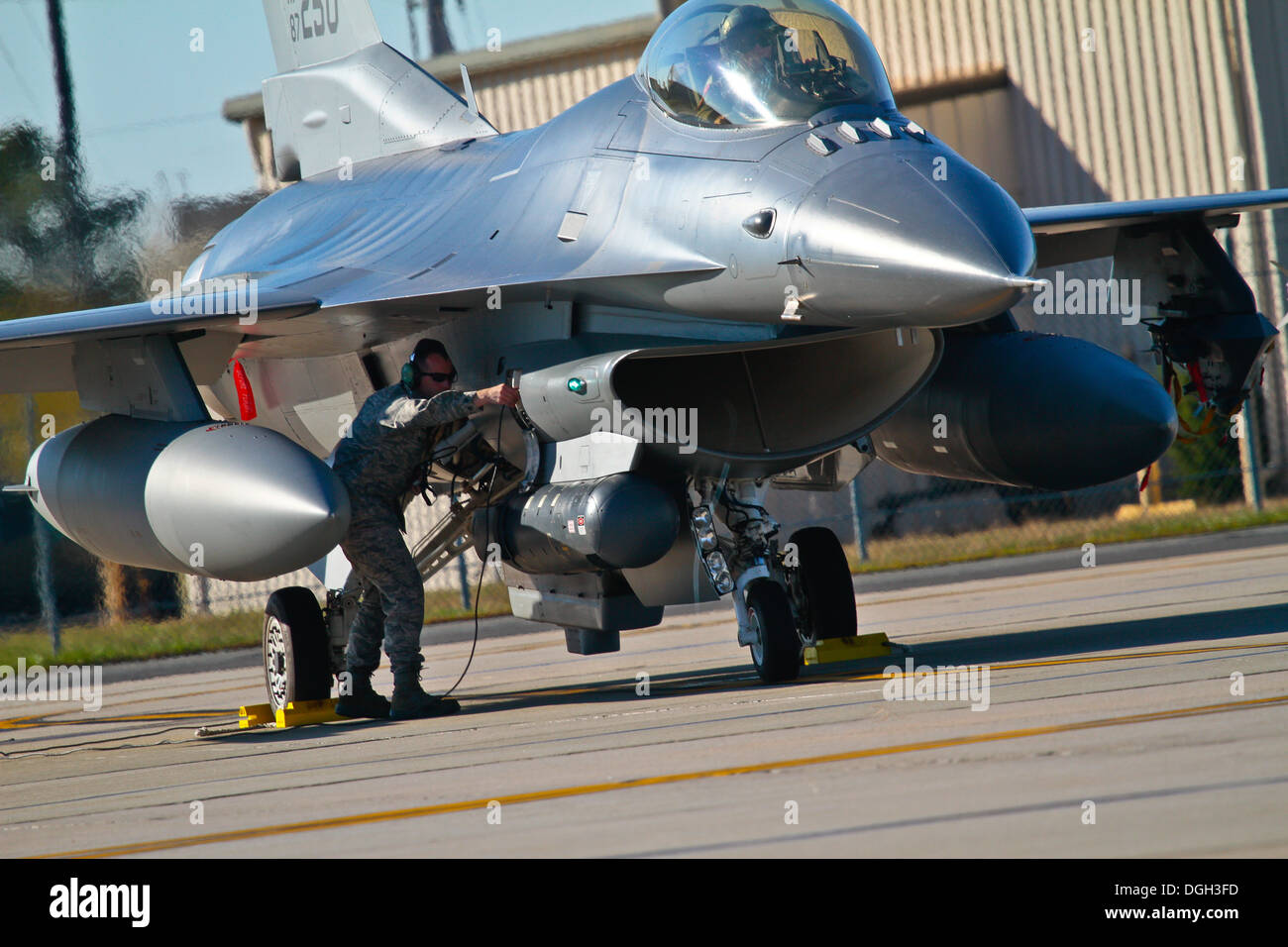 U.S. Air Force Senior Airman Joseph Moffa disconnects his communication ...