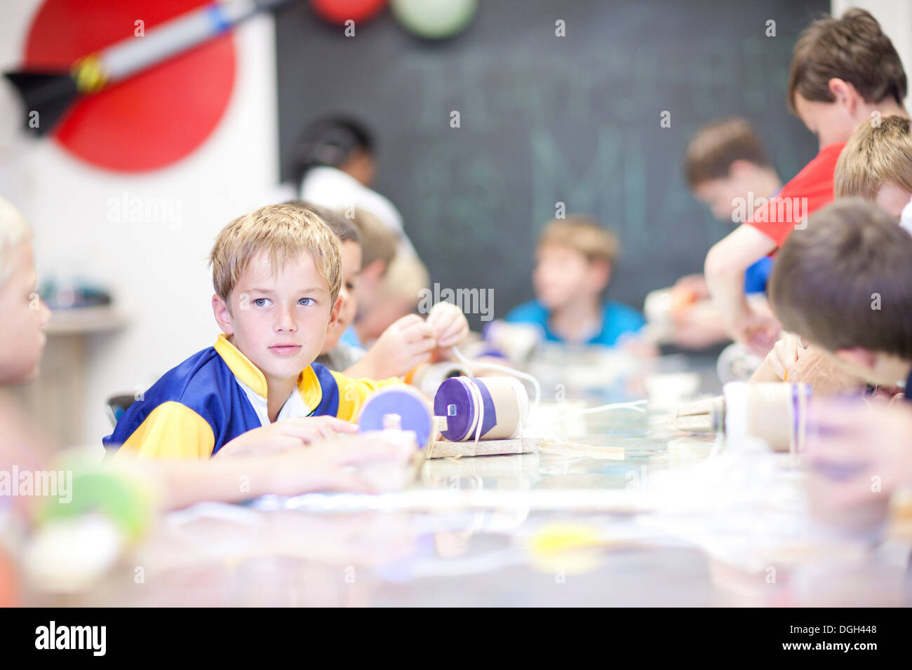 Boys making craft objects Stock Photo - Alamy
