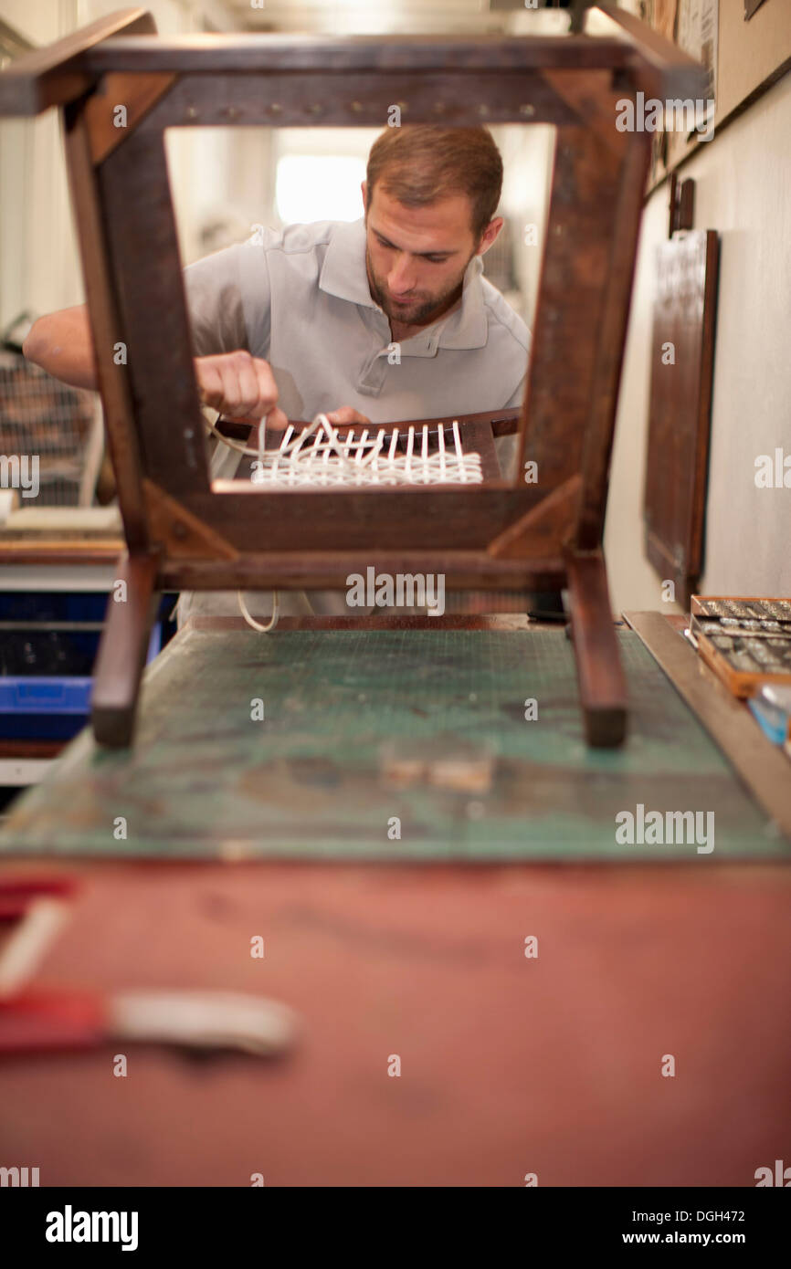 Woman weaving chair back Stock Photo - Alamy