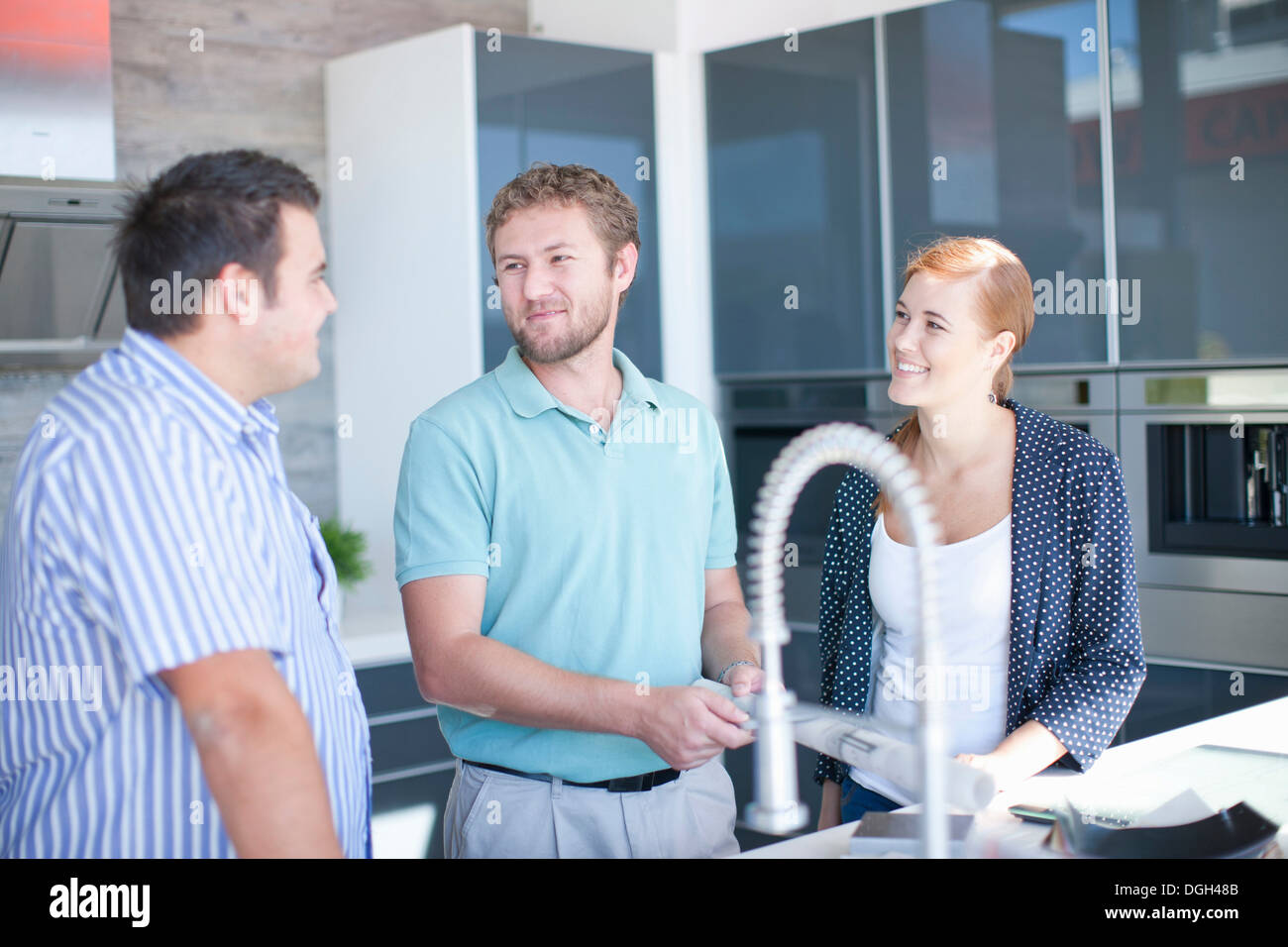 Young Woman Salesman In Showroom High Resolution Stock Photography and ...