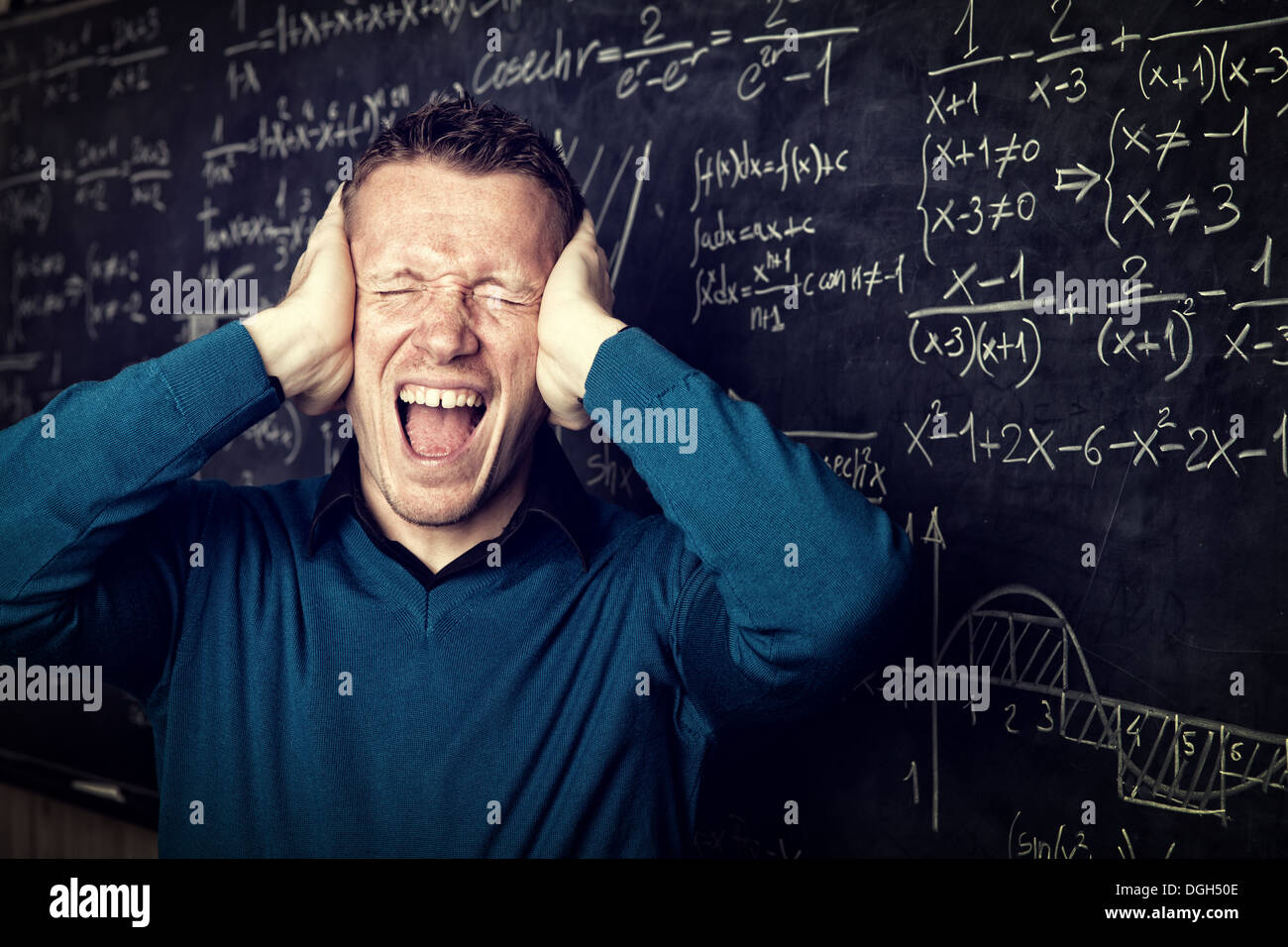 stressed teacher portrait and blackboard background Stock Photo - Alamy