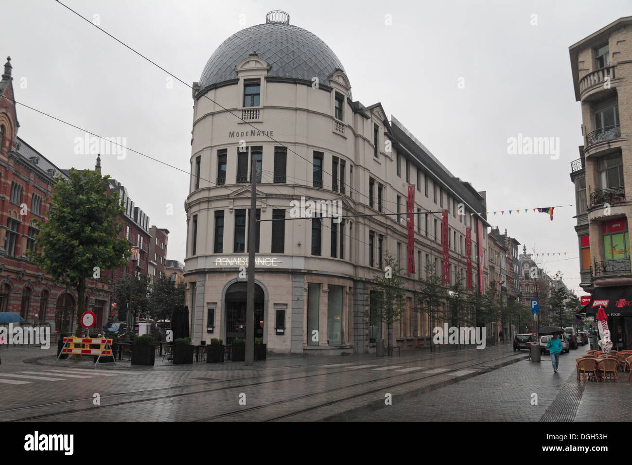 rounded Flatiron-style building. ModeNatie, home to the Flanders ...