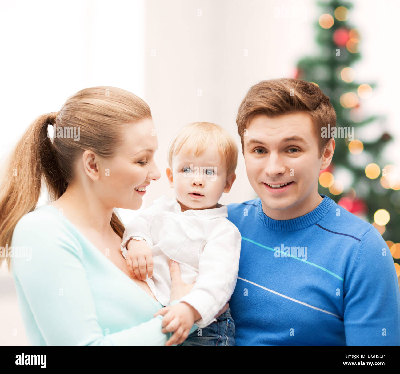 happy parents playing with adorable baby Stock Photo - Alamy