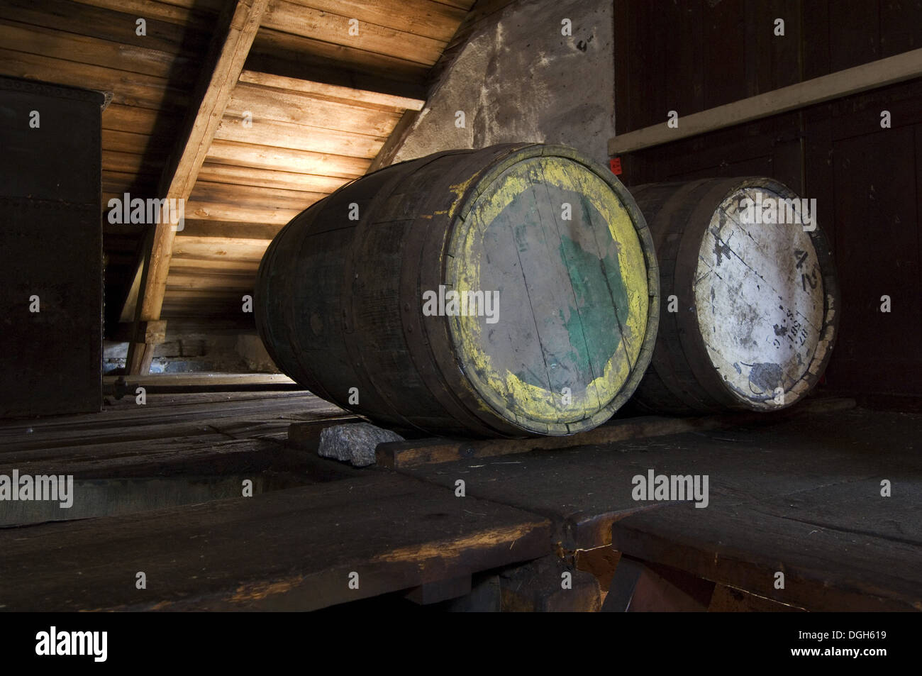Interior of historic oil refinery with oil barrels oldest preserved oil ...