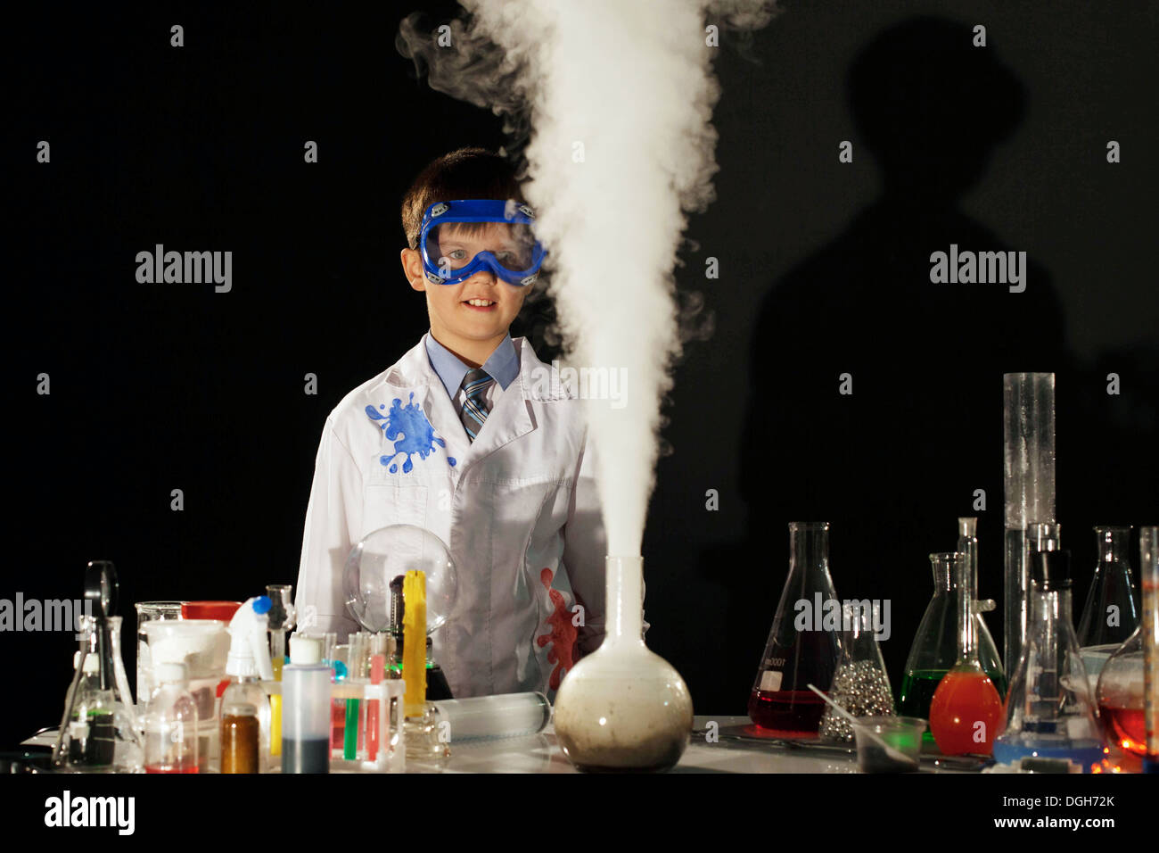 Surprised student looks at reaction of reagents Stock Photo - Alamy
