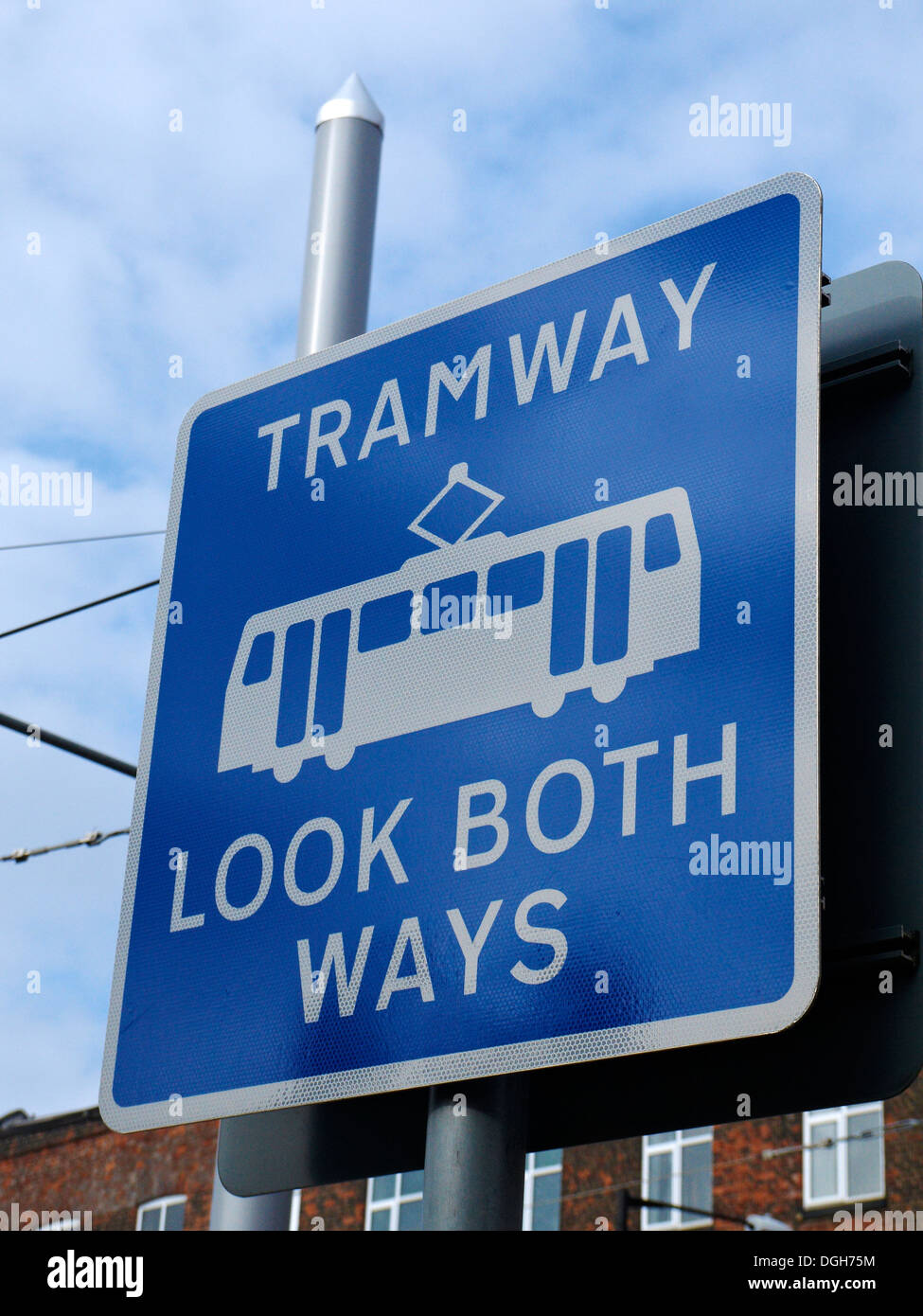 Tramway Look both ways Metrolink tram warning sign in Manchester UK ...