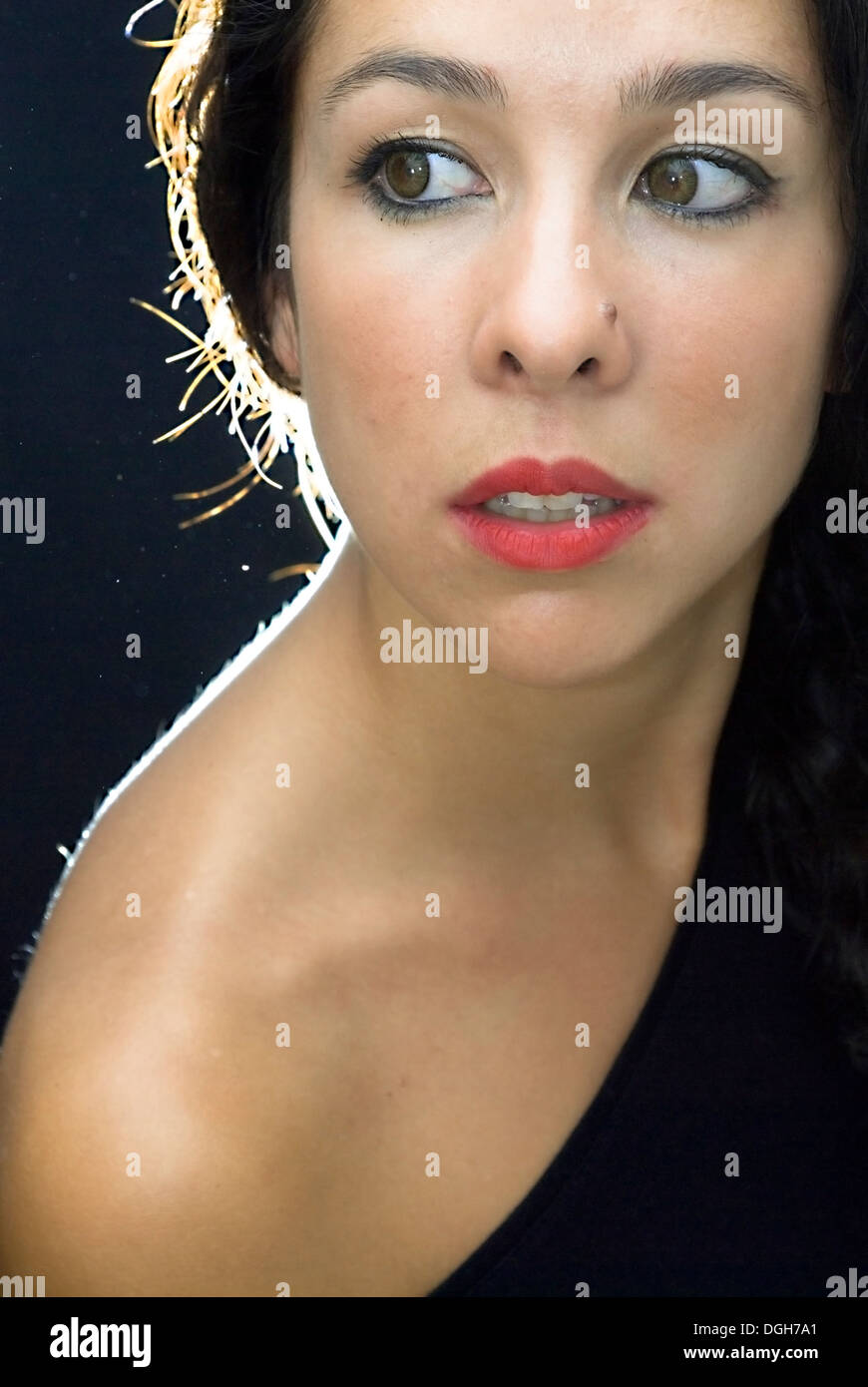 Backlit portrait of an attractive woman Stock Photo - Alamy