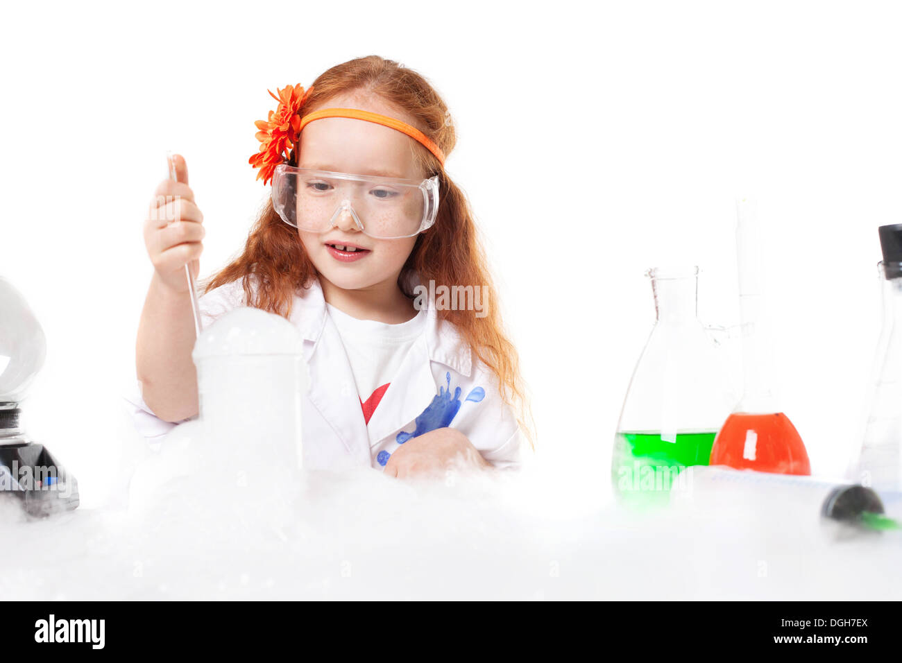 Adorable girl doing experiment, isolated on white Stock Photo - Alamy