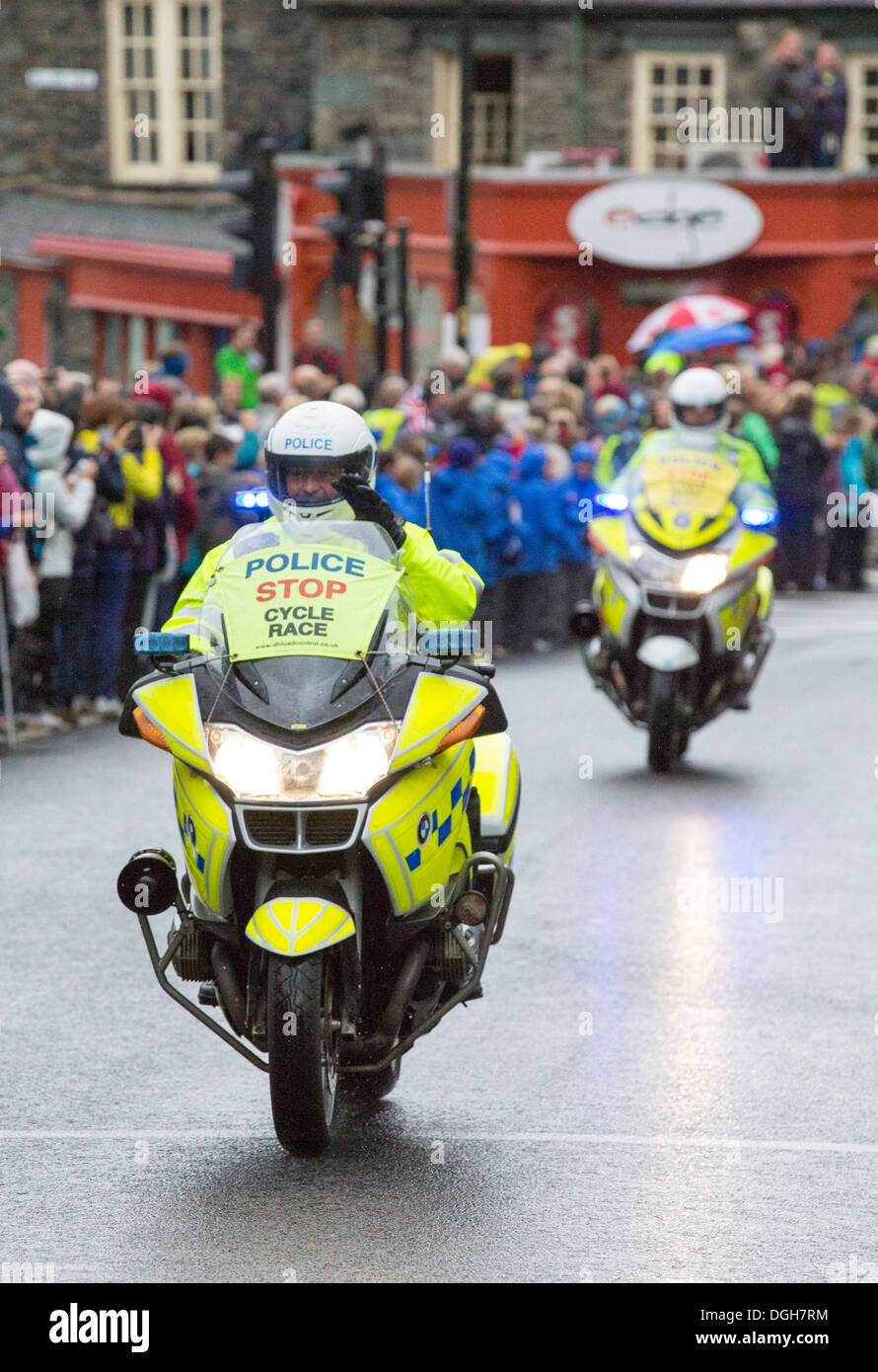 Police motorcyclists ride ahead of the Tour of Britain cycle race as it ...