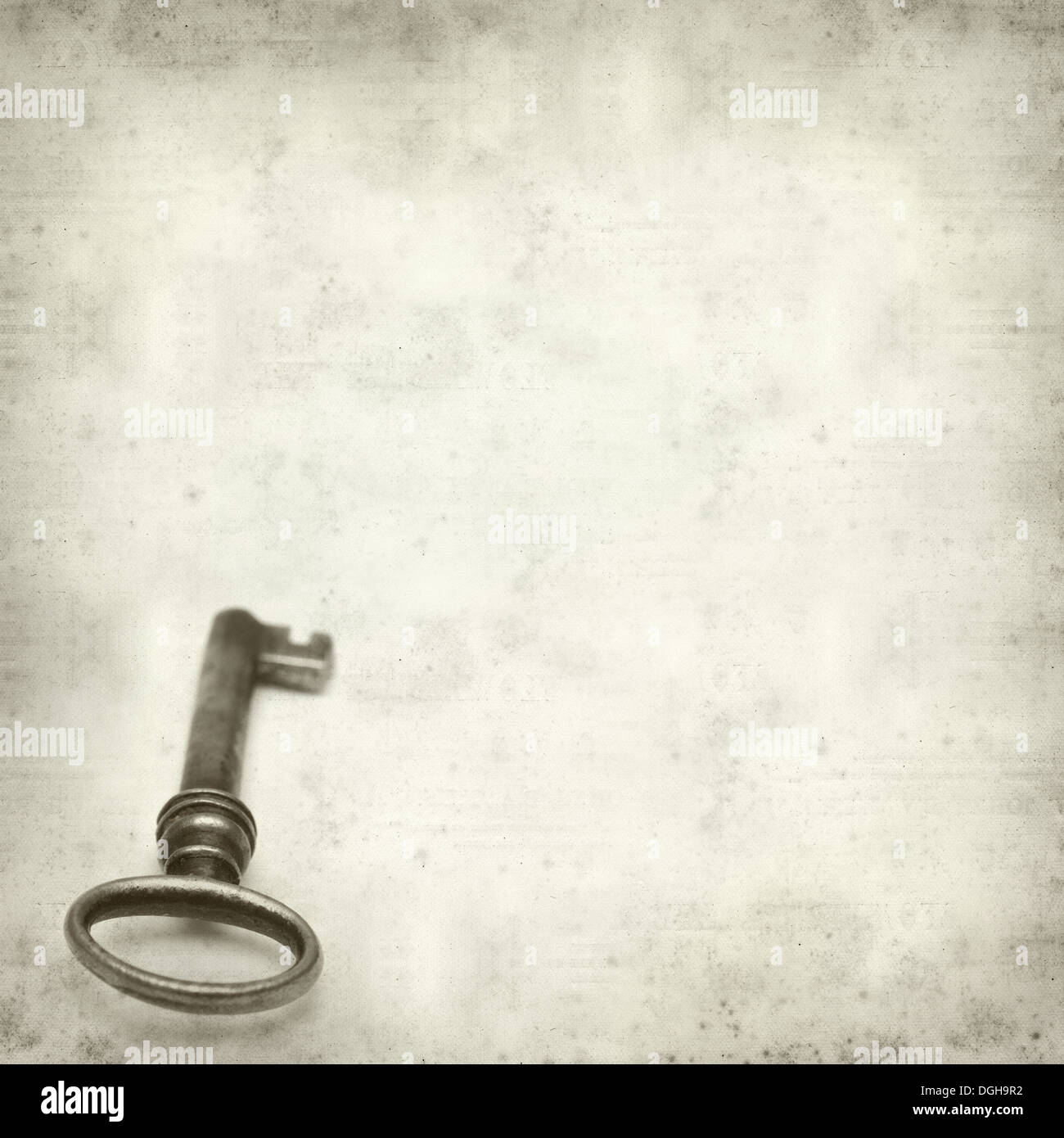 textured old paper background with old rusty key Stock Photo - Alamy