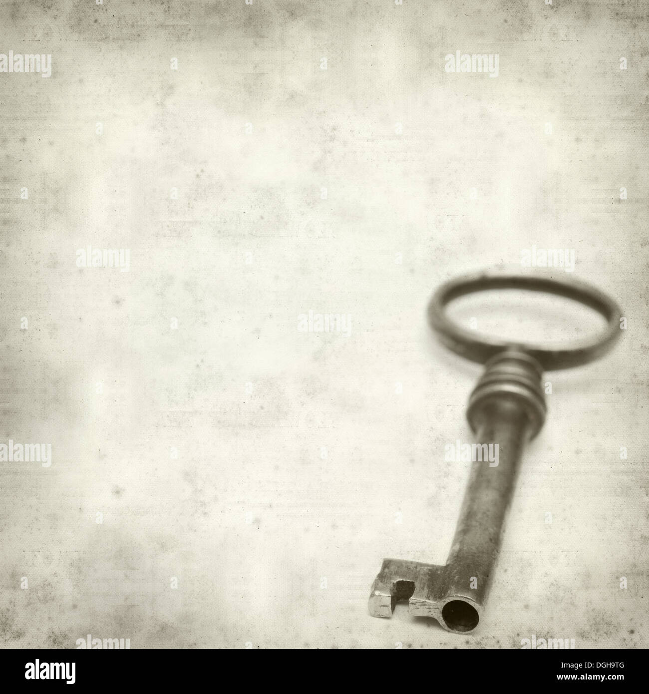 textured old paper background with old rusty key Stock Photo - Alamy