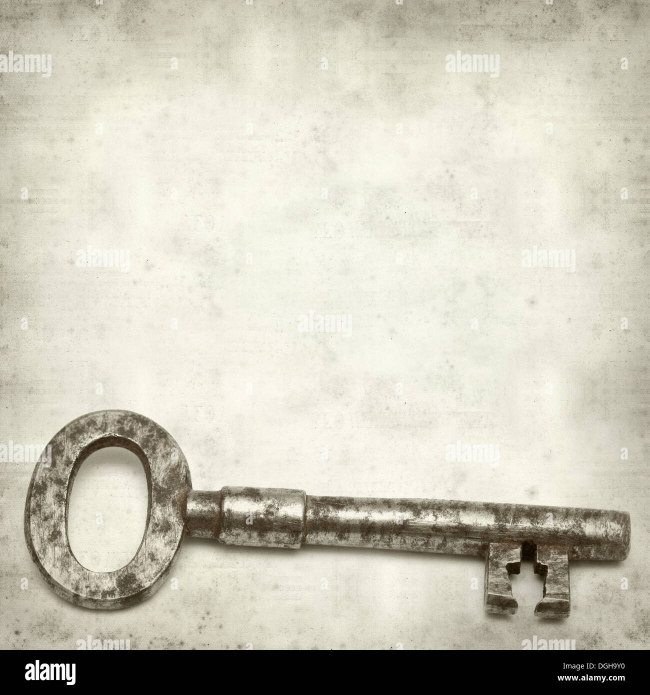 textured old paper background with old rusty key Stock Photo - Alamy