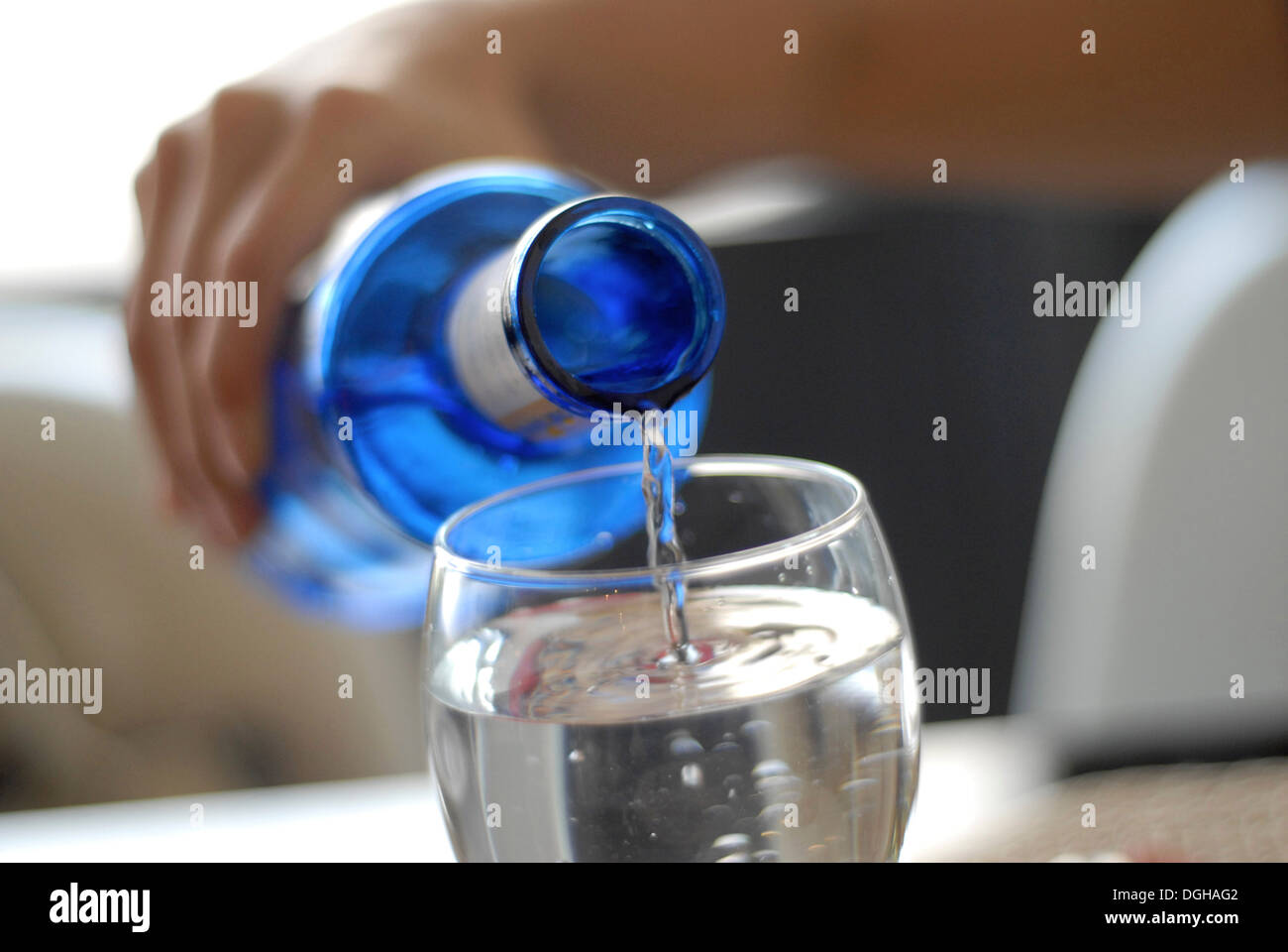 Detail of adult serving water in a restaurant Stock Photo - Alamy