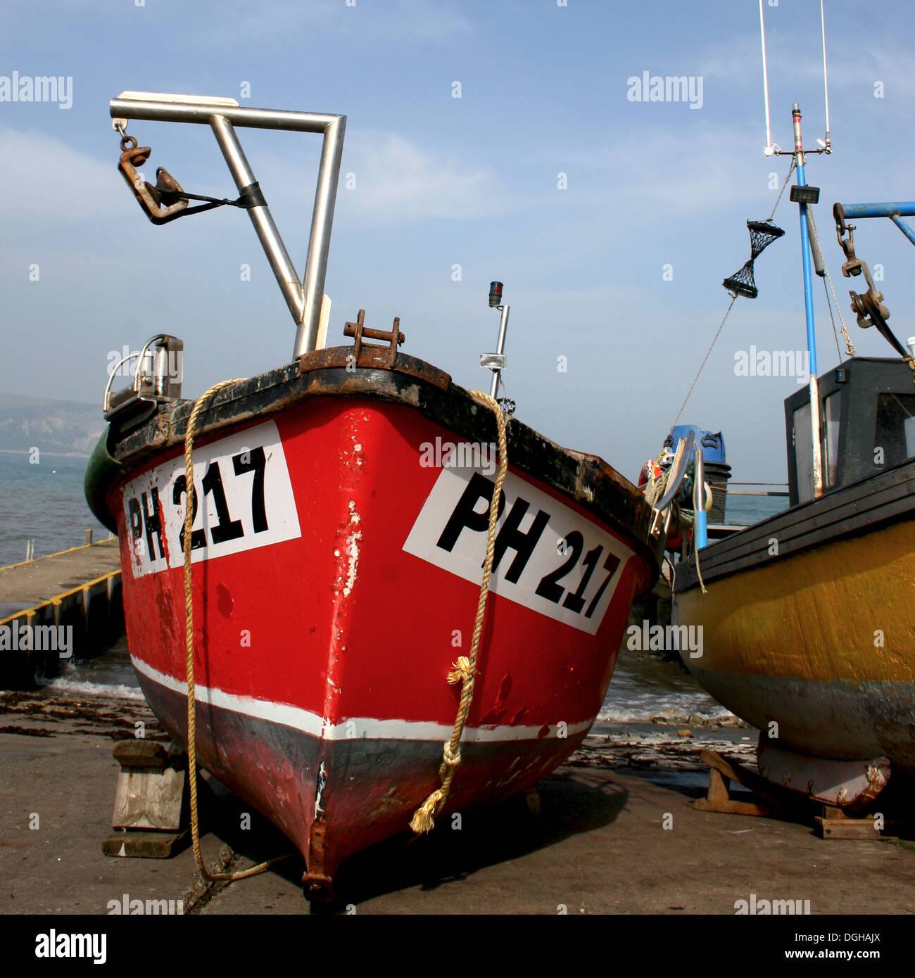 Fishing boats at Swanage Harbour in Dorset. Jurassic Coast location ...