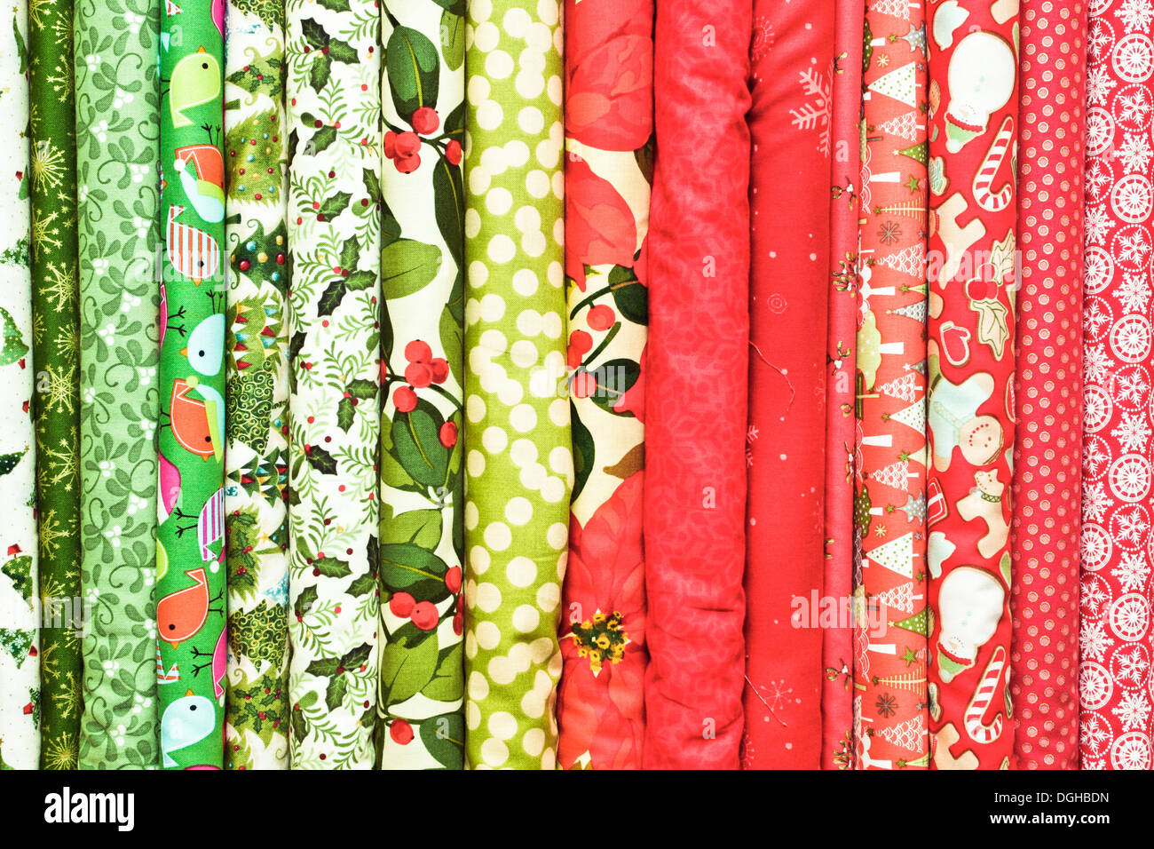 Rolls of colorful christmas fabric as a vibrant background image Stock ...