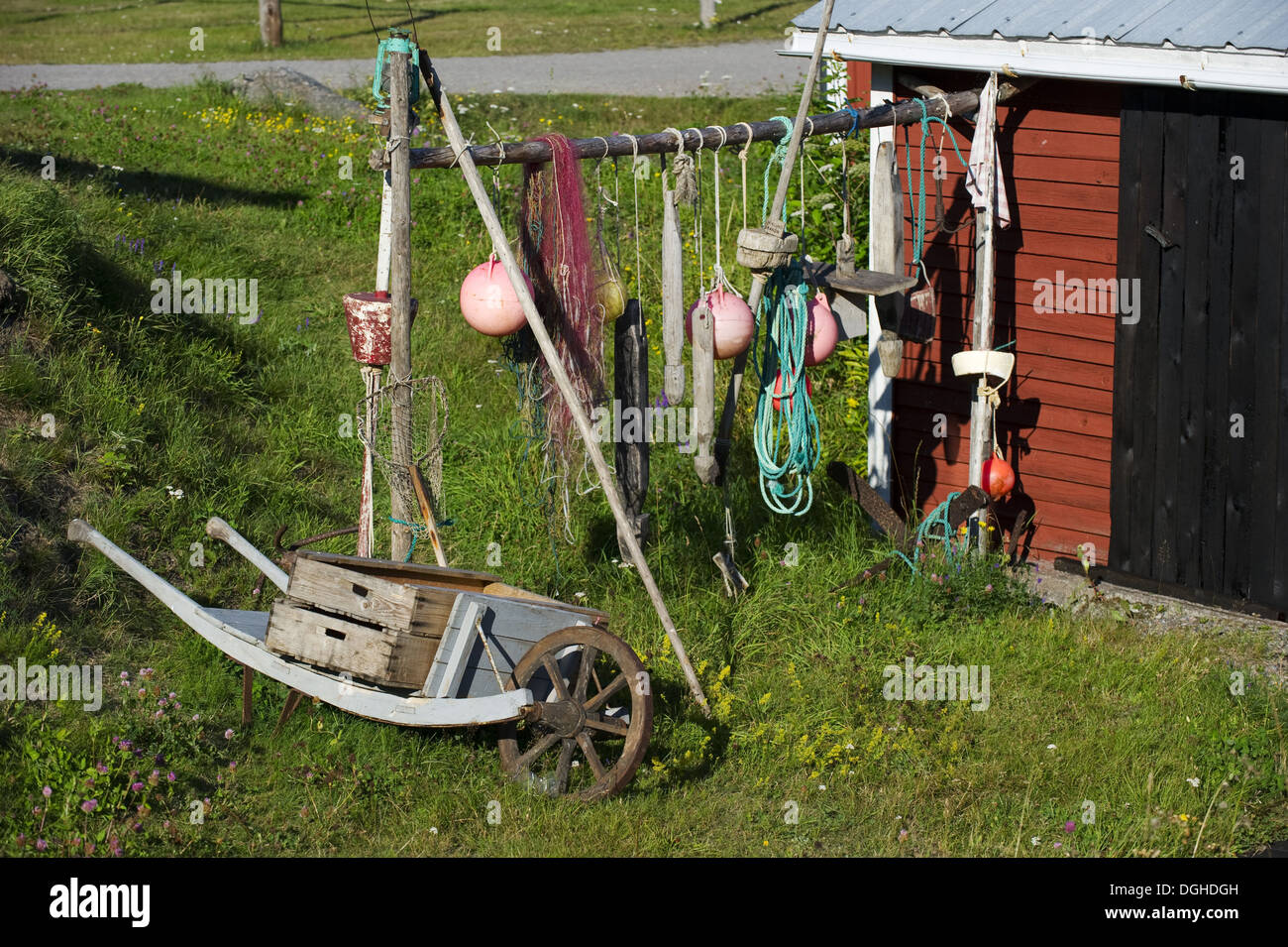 Fishing floats, nets and boxes in fishing village, Trollharens ...