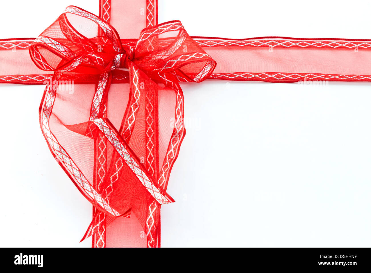 Red ribbon placed as rectangular gift box on white background with copy ...