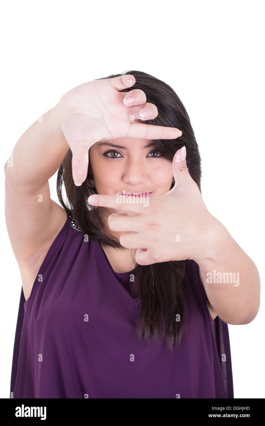 Attractive smiling woman creating a border around her face Stock Photo ...