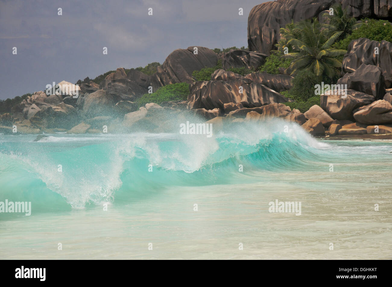 Breaking Wave in Tropical Water Stock Photo - Alamy