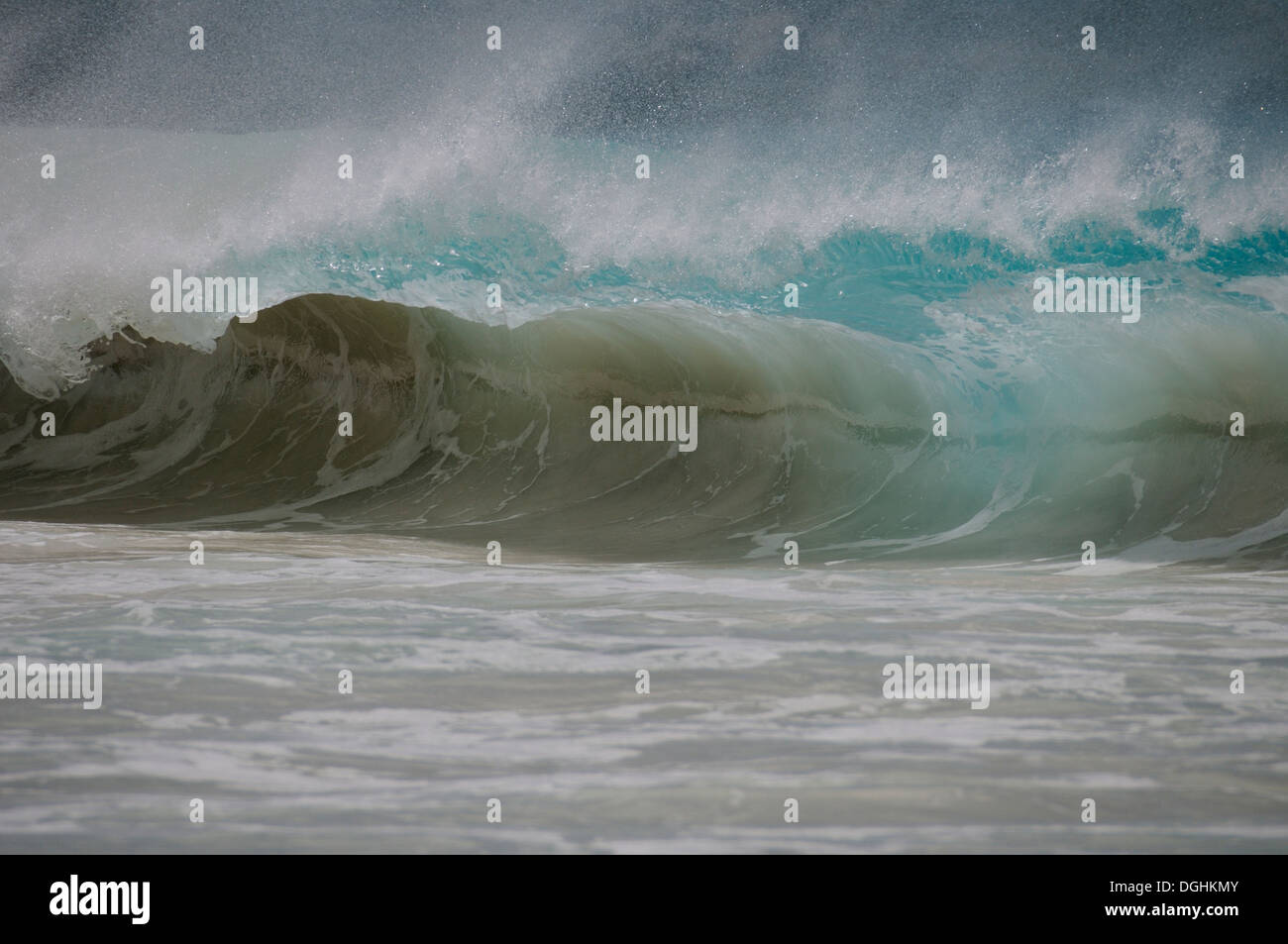 Breaking Wave in Tropical Water Stock Photo - Alamy