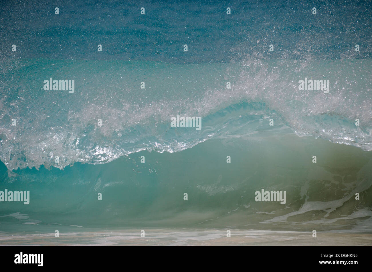 Breaking Wave in Tropical Water Stock Photo - Alamy