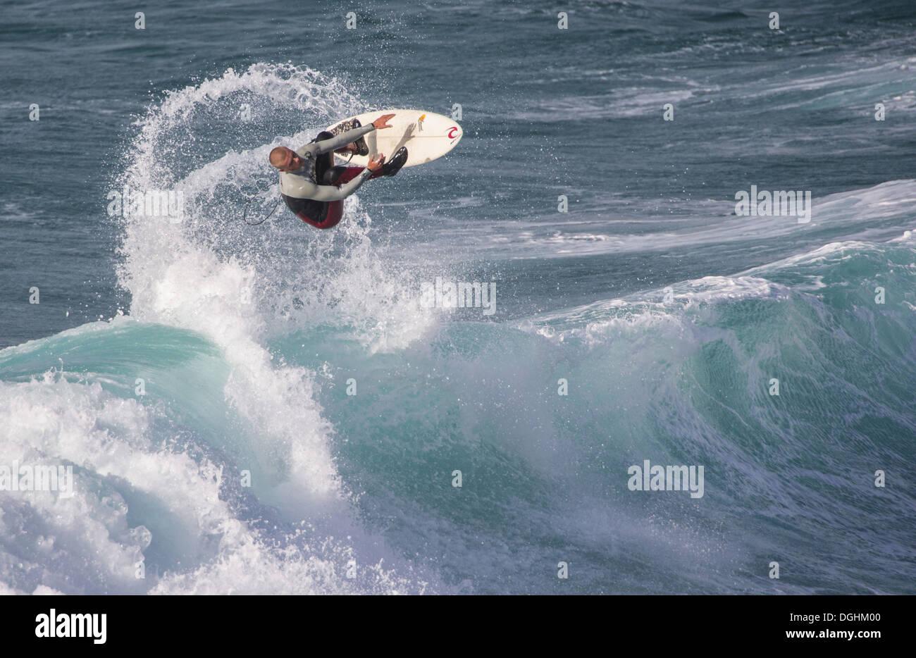 Man surfing on wave, Sennen Cove, Sennen, Cornwall, England, May Stock ...