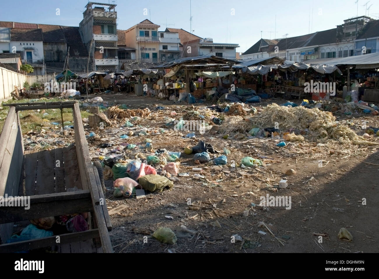 Piles of garbage are strewn behind the main food market in Kampong Cham ...
