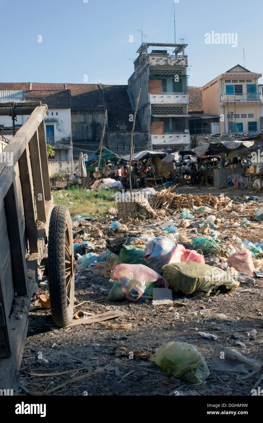 Piles of garbage are strewn behind the main food market in Kampong Cham ...