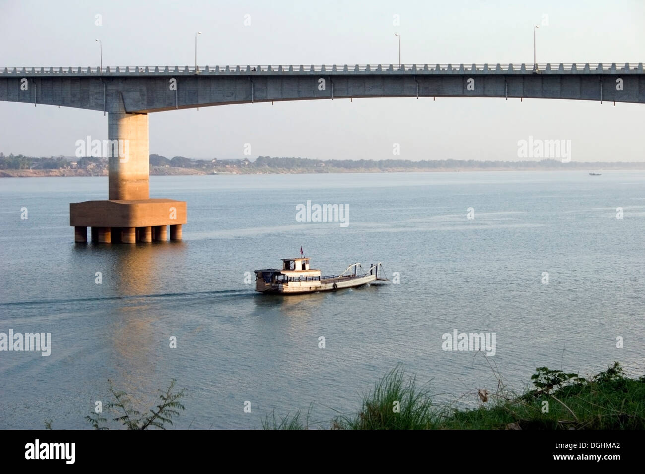 A boat is going under the Japanese Friendship Bridge, donated by Japan ...
