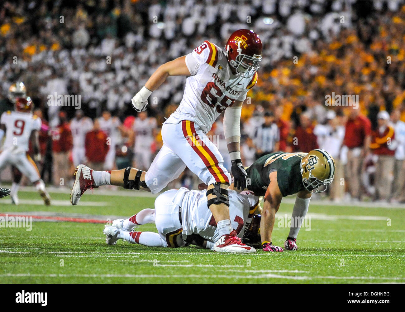 Iowa State Cyclones running back Aaron Wimberly (2) is hit hard by ...