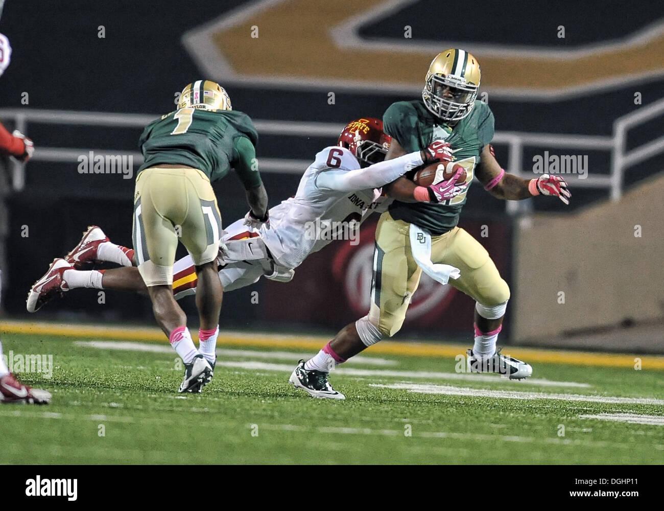 Baylor Bears running back Shock Linwood (32) carries the ball as he is ...