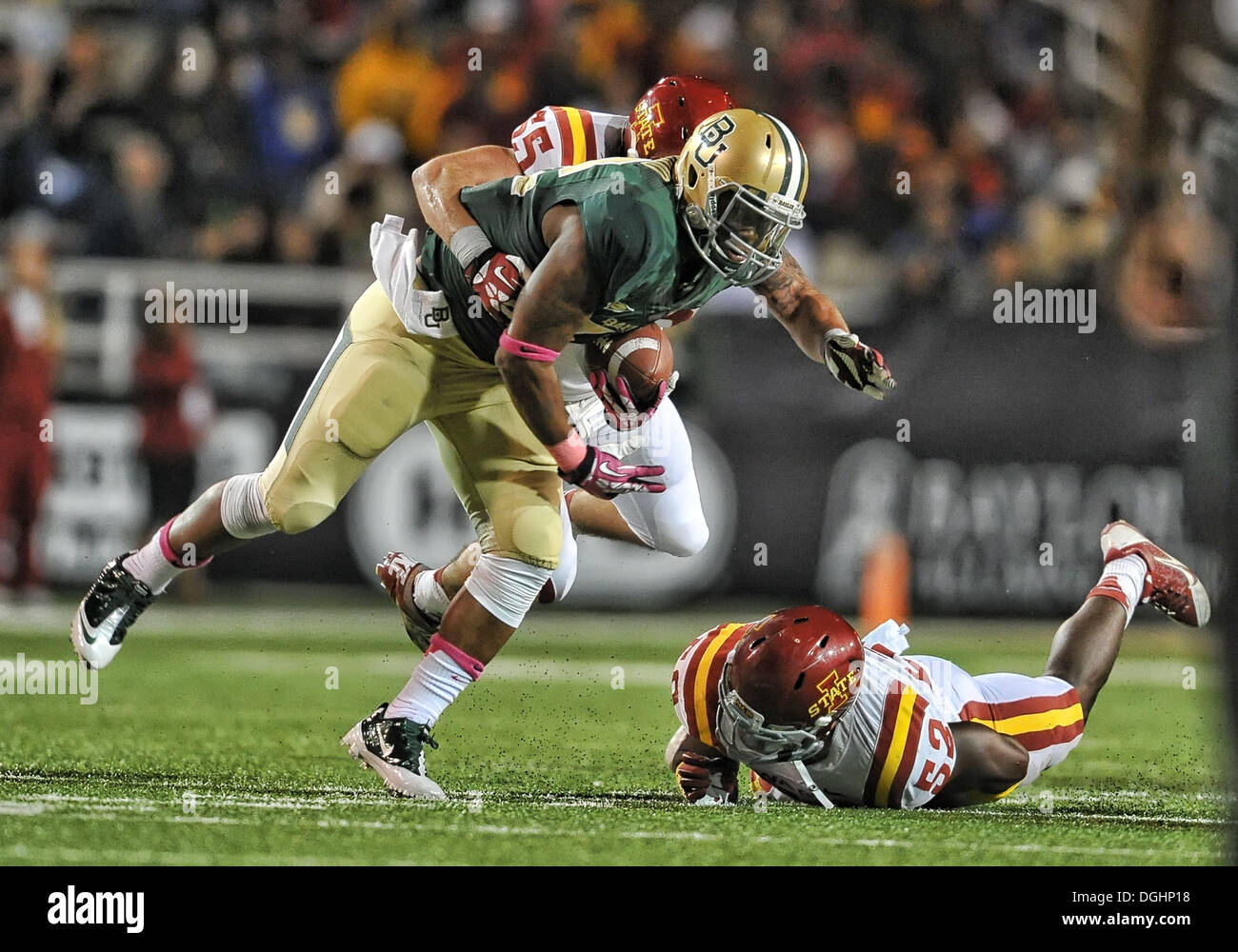 Baylor Bears running back Shock Linwood (32) carries the ball as he is ...