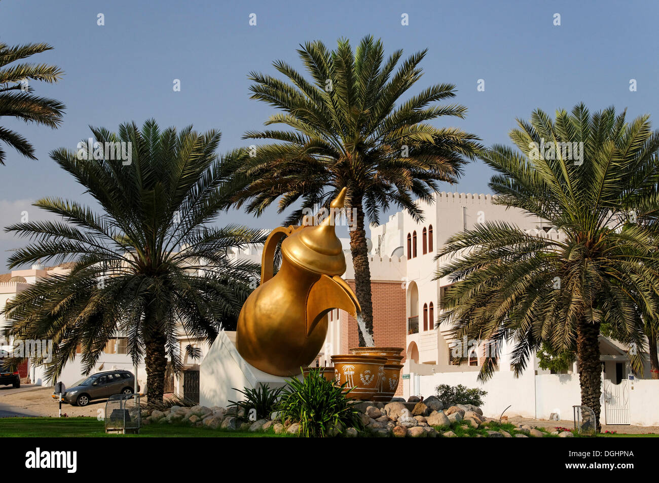 Oversize sculpture of a coffee pot with two cups, Capital Area, Oman ...