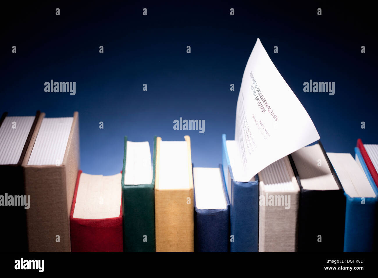 several different color books in a row Stock Photo - Alamy